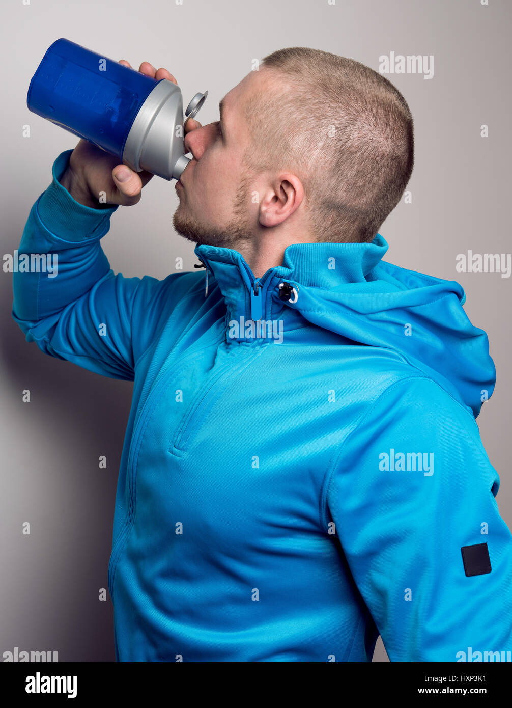 Athletic man drinks from shaker hi-res stock photography and images - Alamy