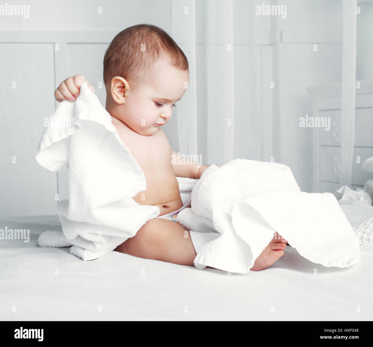Baby girl wearing diapers in hi-res stock photography and images - Alamy