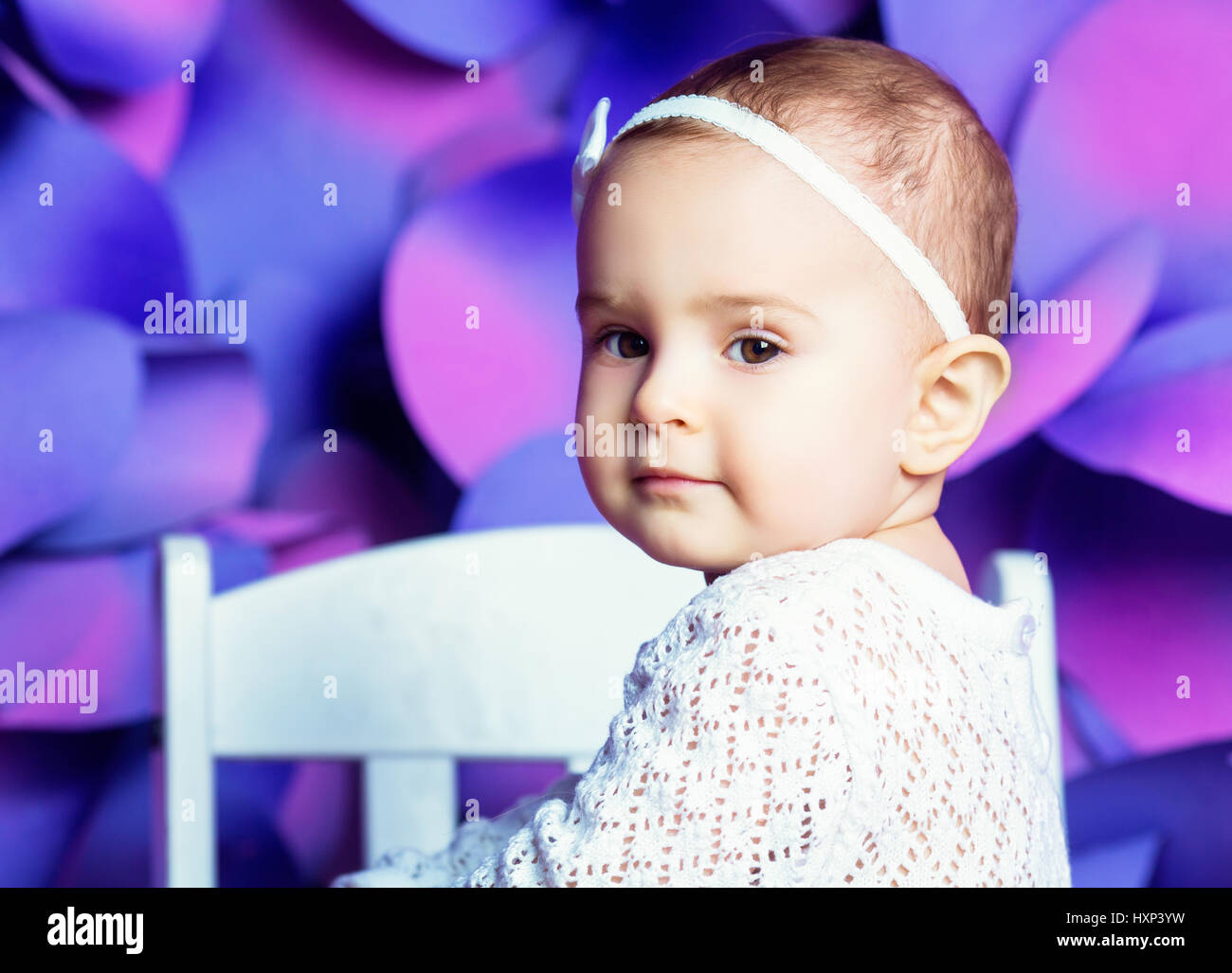 happy one year old baby in a studio against colorful background Stock ...