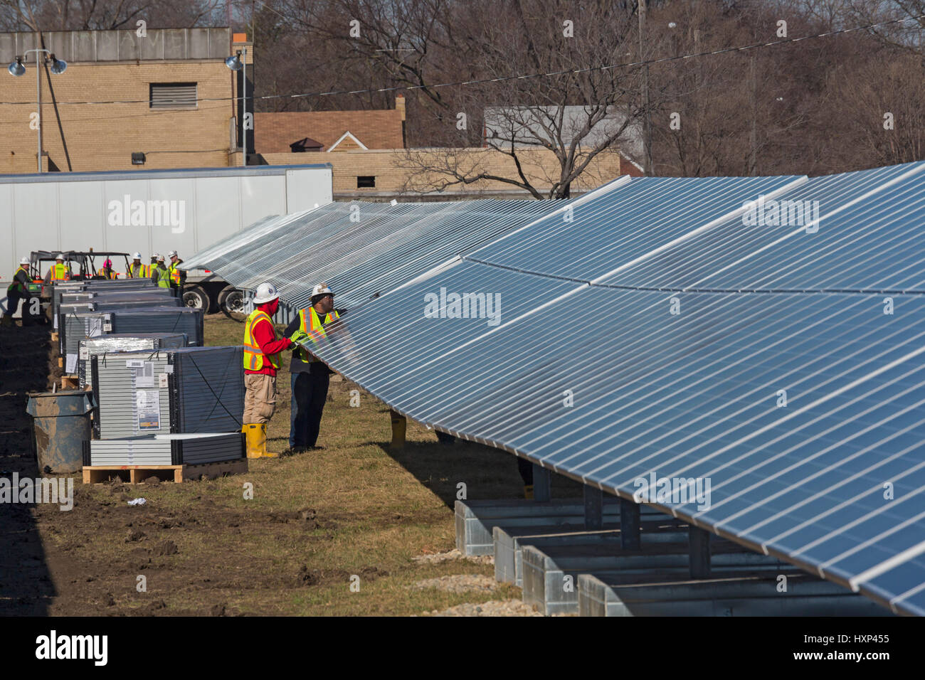 Detroit, Michigan - Workers build a 2 megawatt solar installation for ...