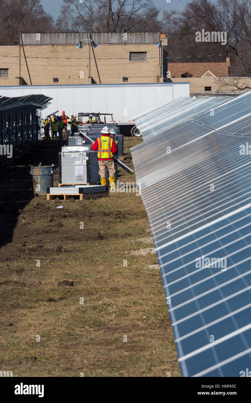 Detroit, Michigan - Workers build a 2 megawatt solar installation for ...
