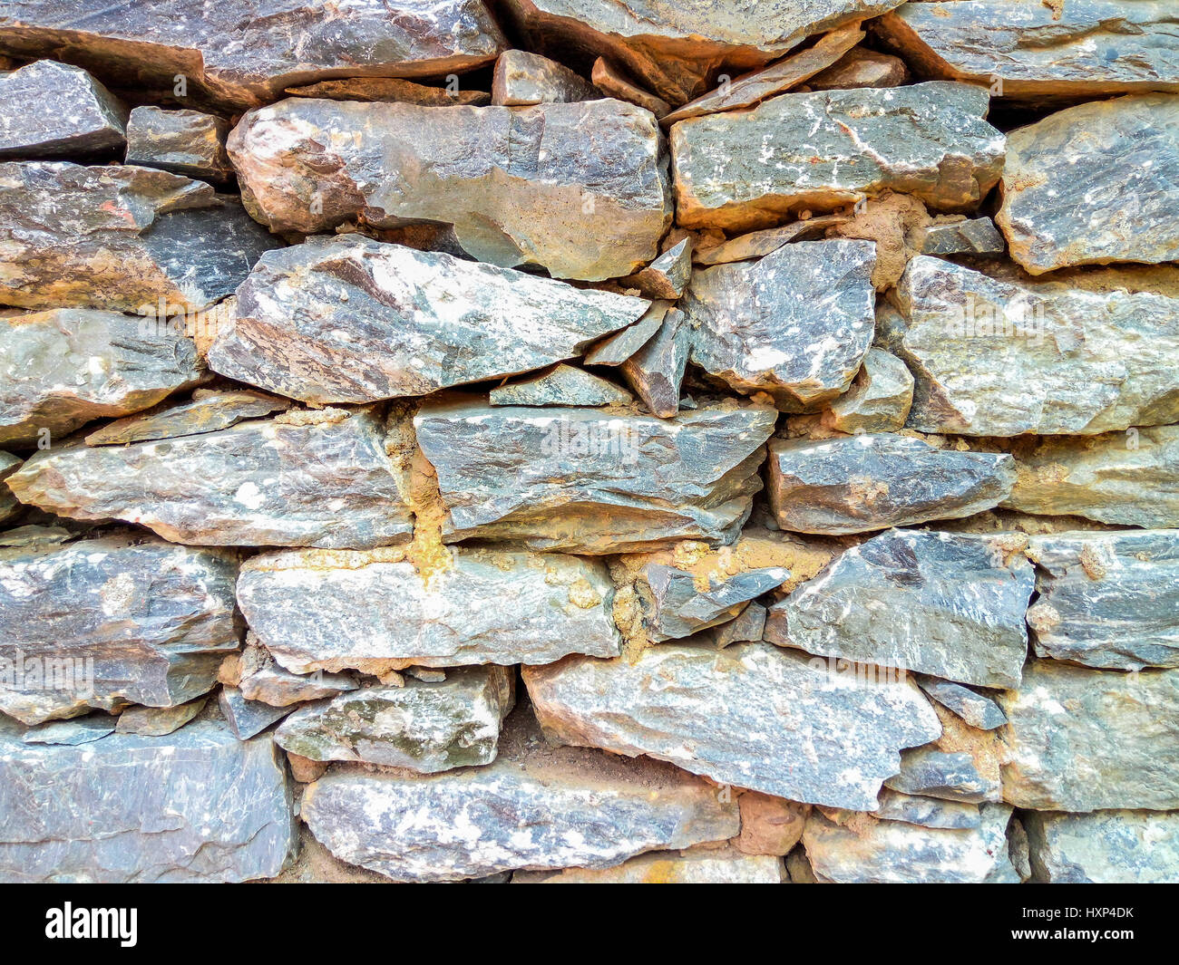Closeup to Stack of Old Hard Rock Background Stock Photo - Alamy