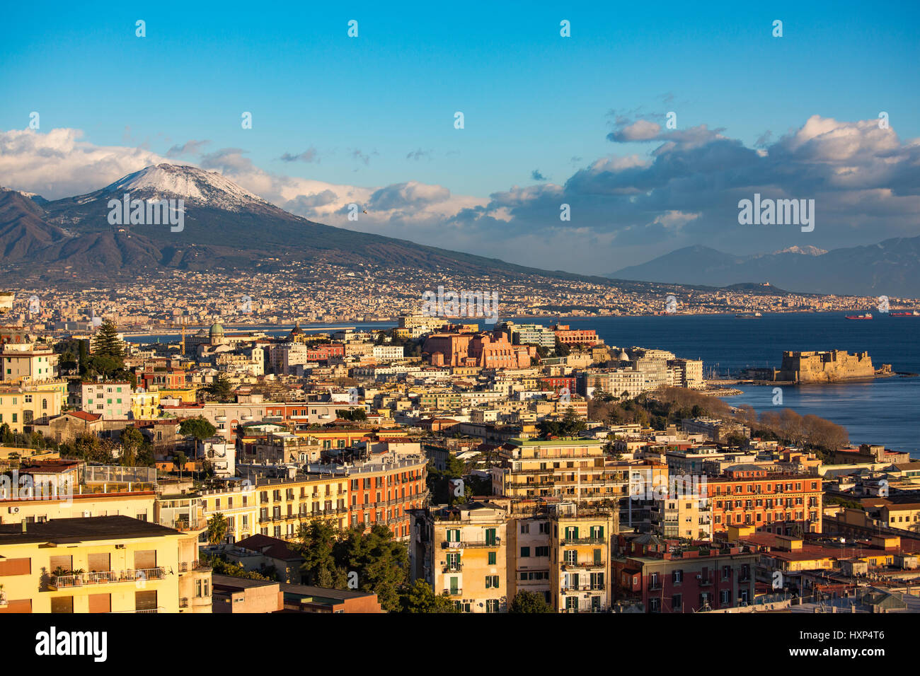 Aerial view of Naples with Vesuvius mount with snow on the background ...