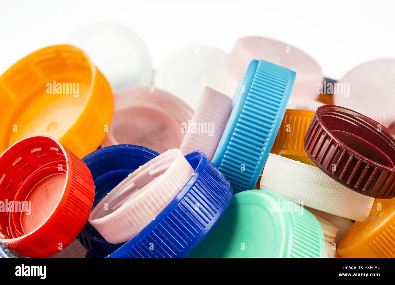 Multi colored Plastic caps ready for recycling Stock Photo - Alamy
