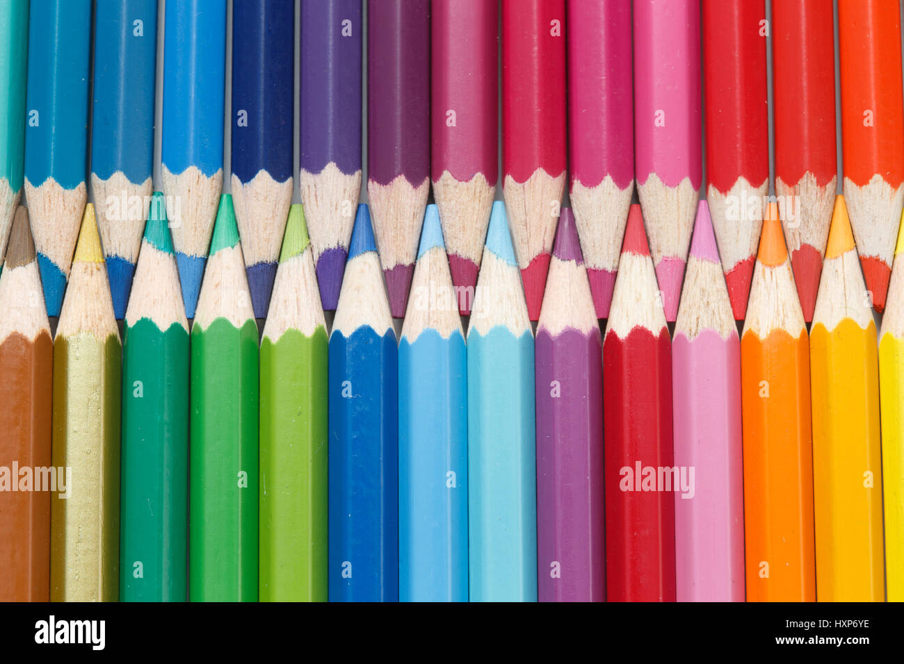 Coloured pencils in a row Stock Photo - Alamy