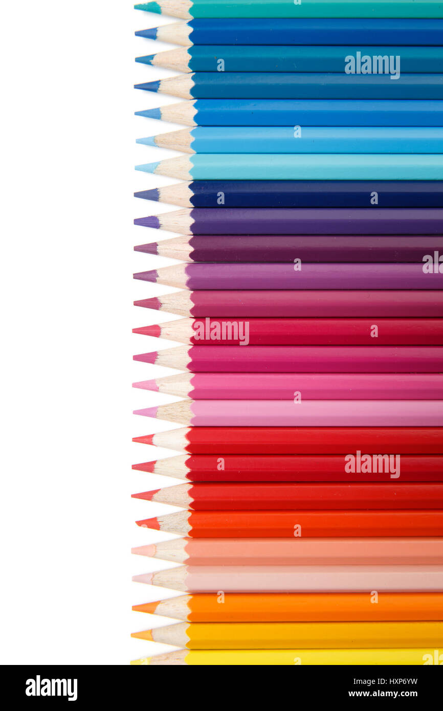 Coloured pencils in a row Stock Photo - Alamy