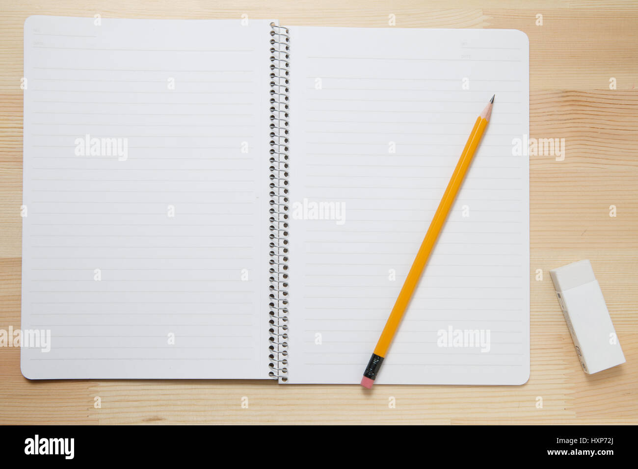 Note pad with pencil Stock Photo - Alamy