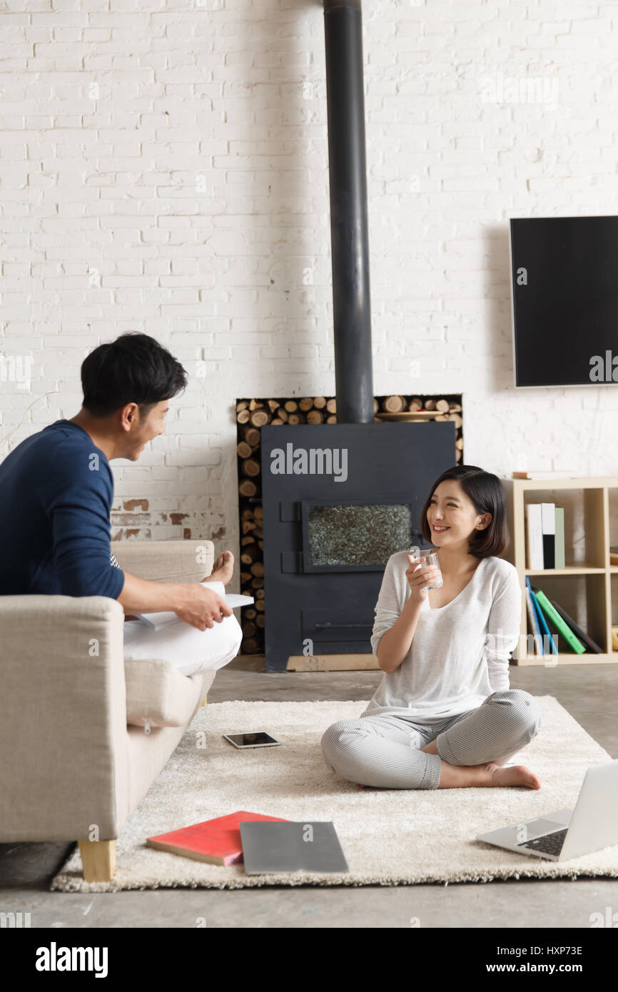 Young couple at home Stock Photo - Alamy