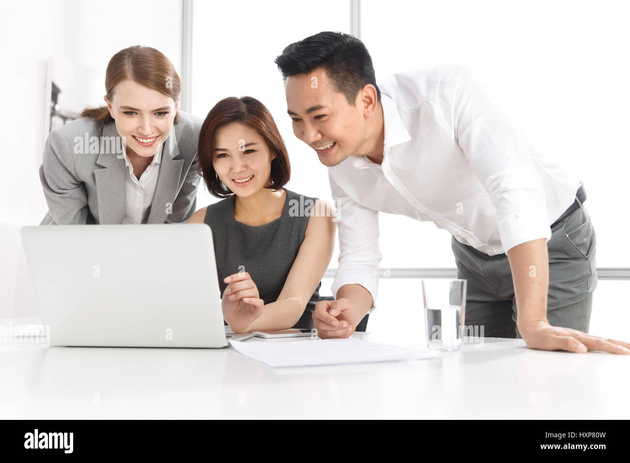 Three people working in Cut Out Stock Images & Pictures - Alamy