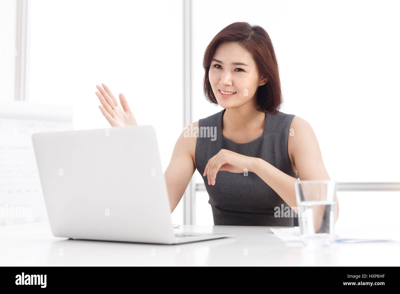 Young man using computer in office Cut Out Stock Images & Pictures - Alamy
