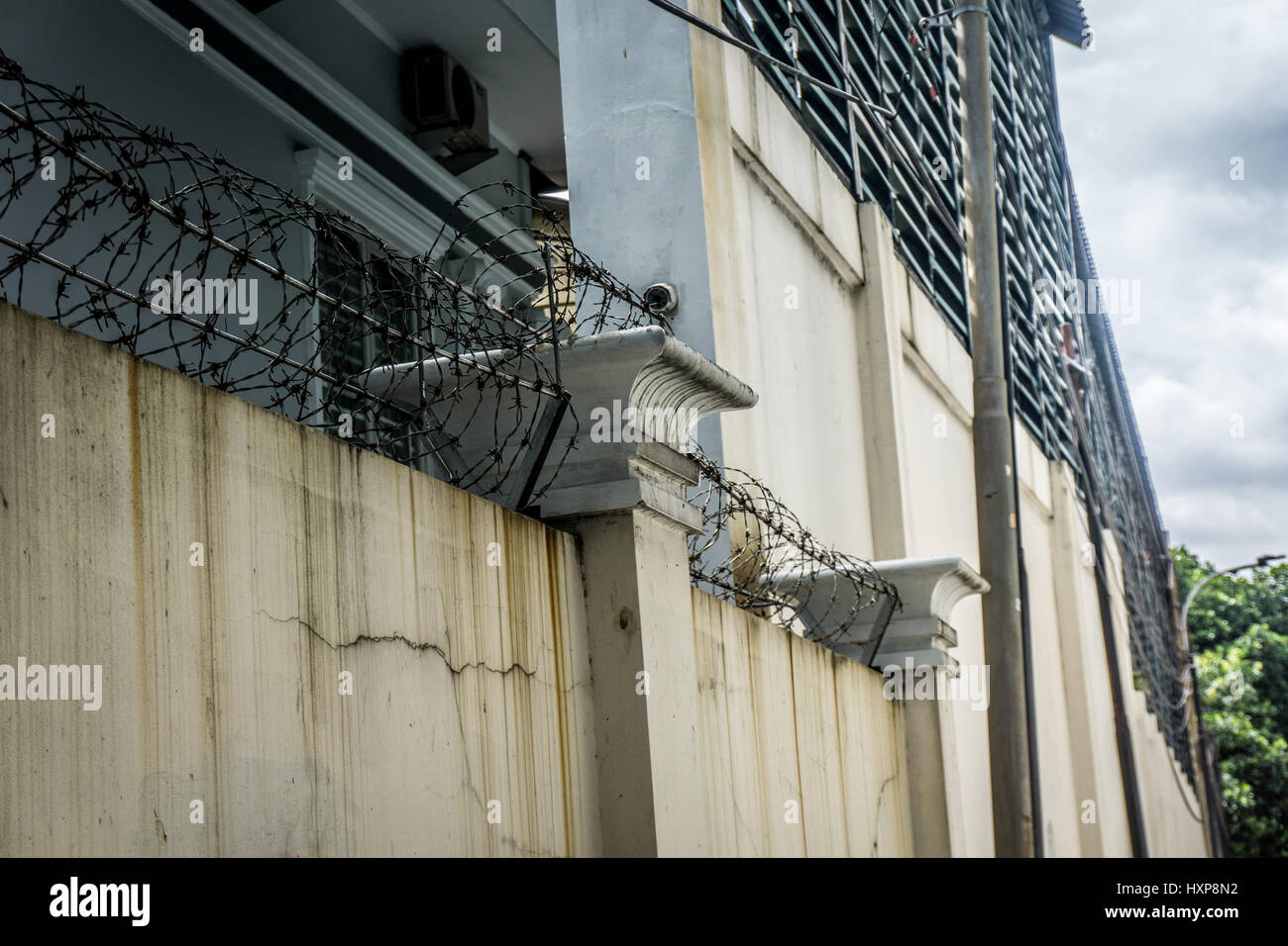 High wall of a house with barbed wire photo taken in Jakarta Indonesia ...