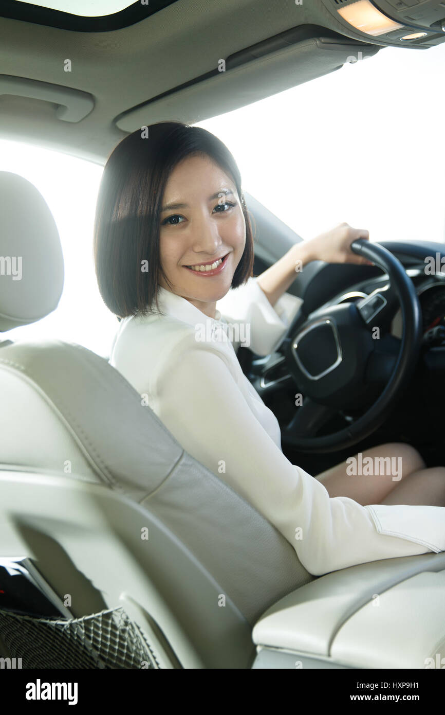 Young woman on driving Stock Photo - Alamy