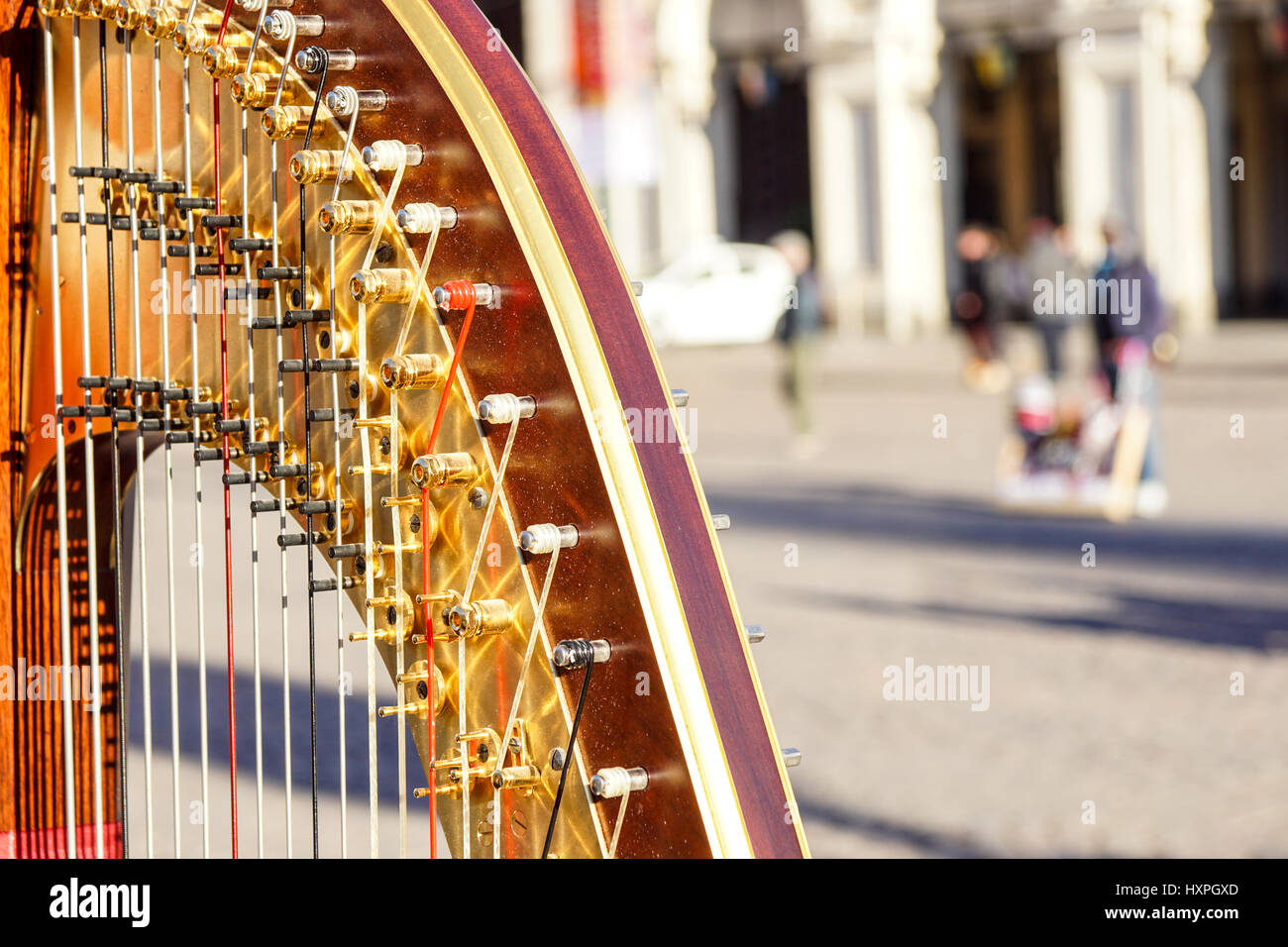 Part of musical instrument called harp in abstract background Stock ...