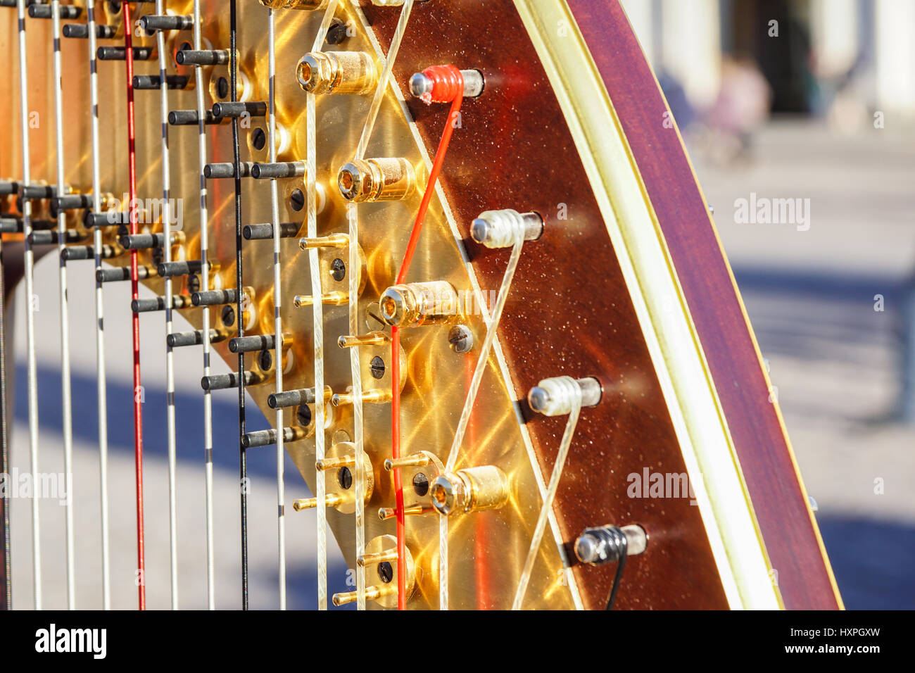 Part of musical instrument called harp in abstract background Stock ...
