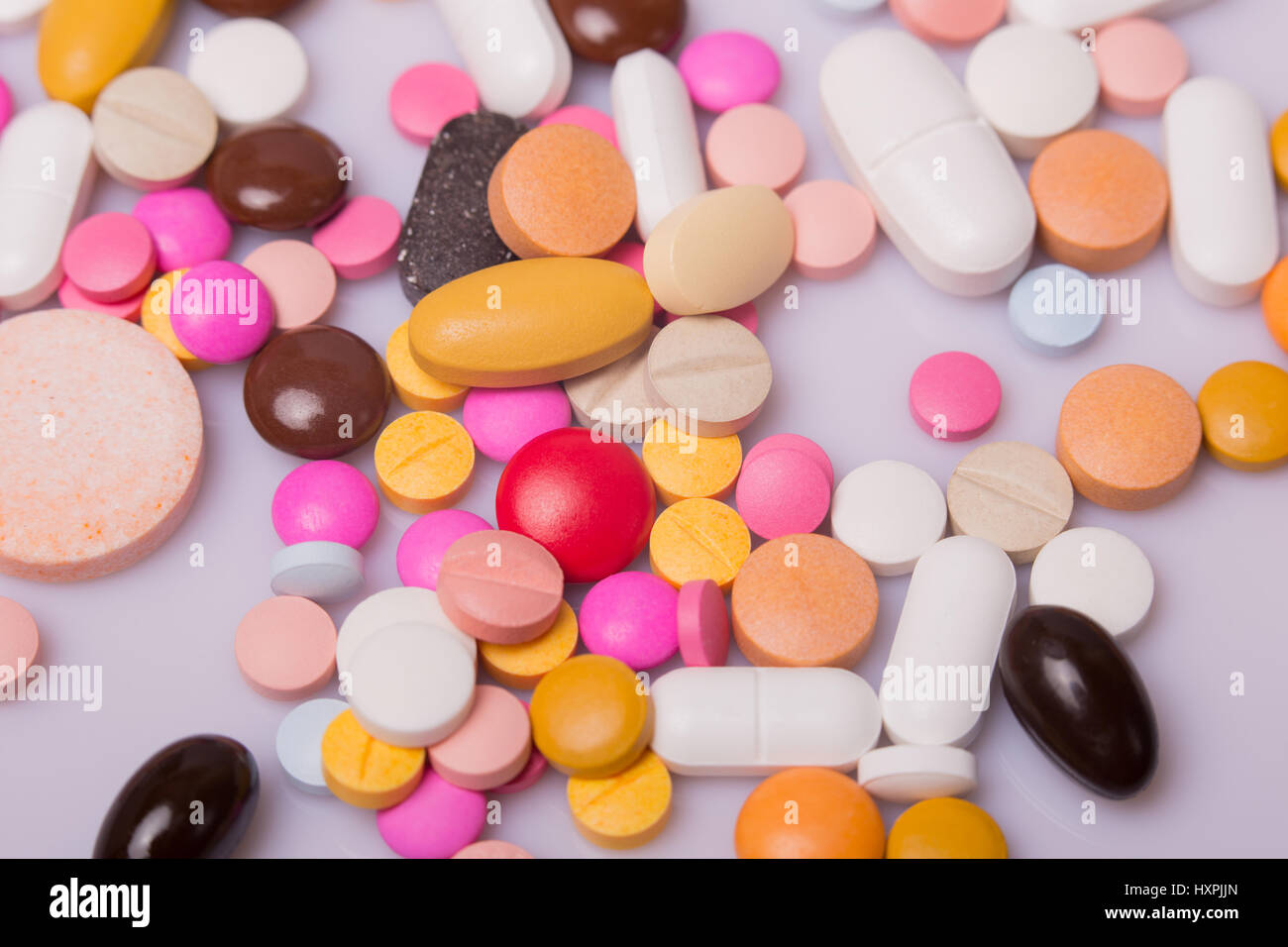 different Tablets pills capsule heap mix therapy drugs Stock Photo - Alamy