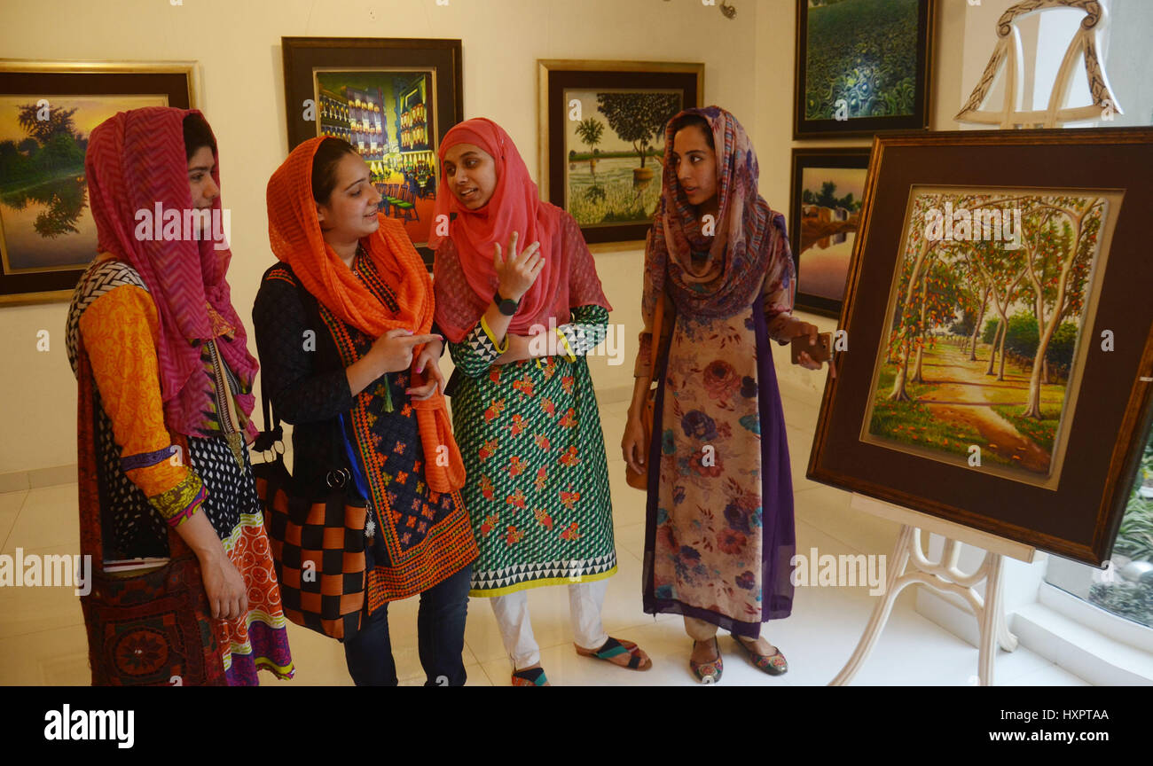 Lahore, Pakistan. 30th Mar, 2017. Pakistani visitors are viewing the ...