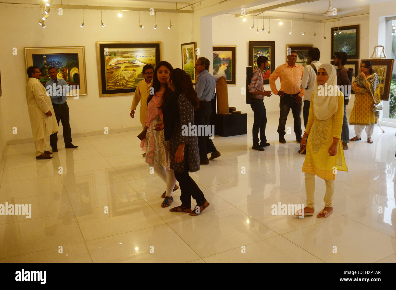 Lahore, Pakistan. 30th Mar, 2017. Pakistani visitors are viewing the ...