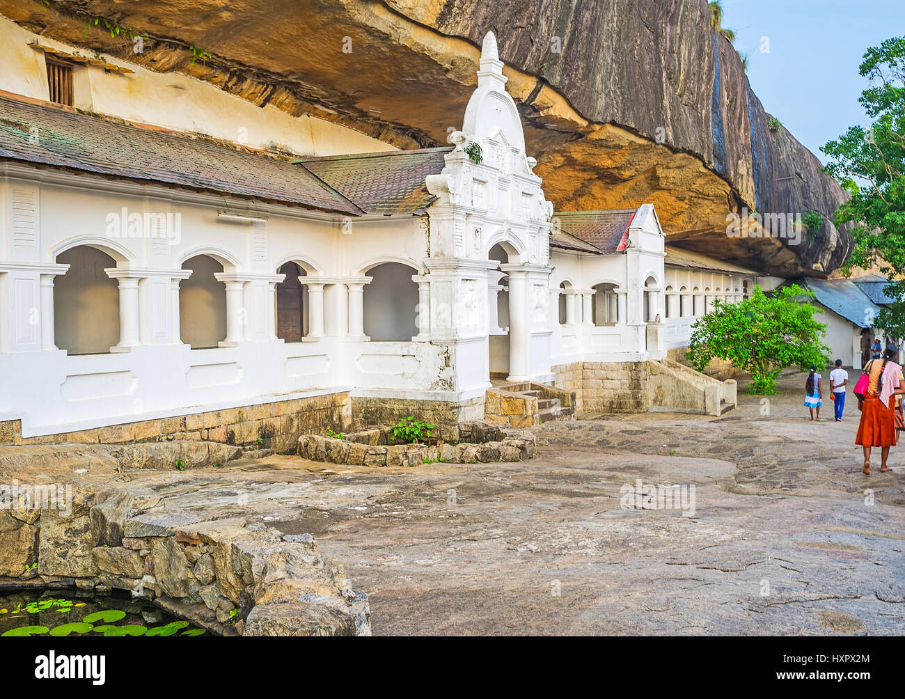 The ancient rock temples with white stepped gables, Dambulla, Sri Lanka ...