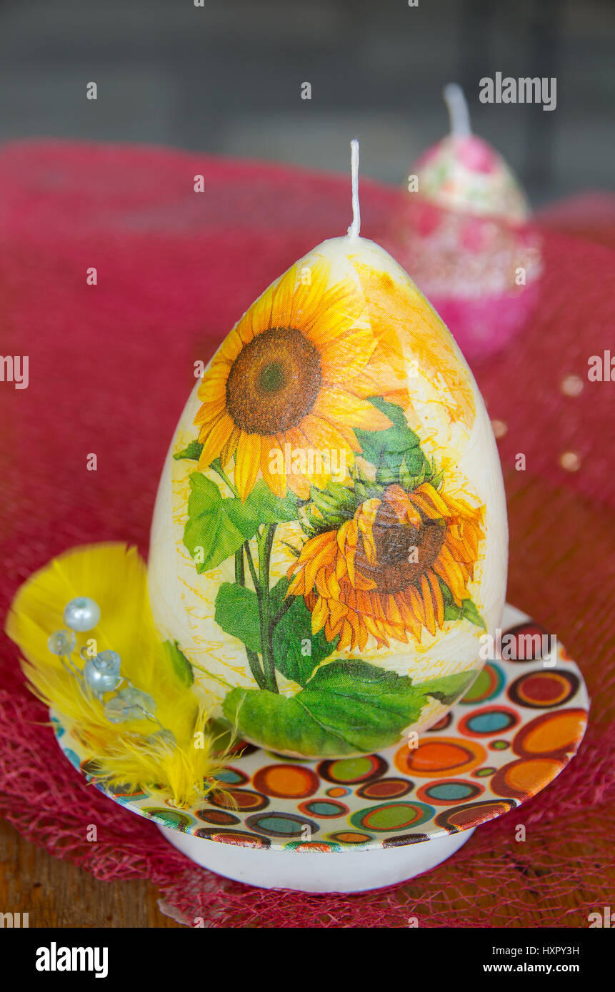 Decorated Easter candles in the form of eggs Stock Photo - Alamy