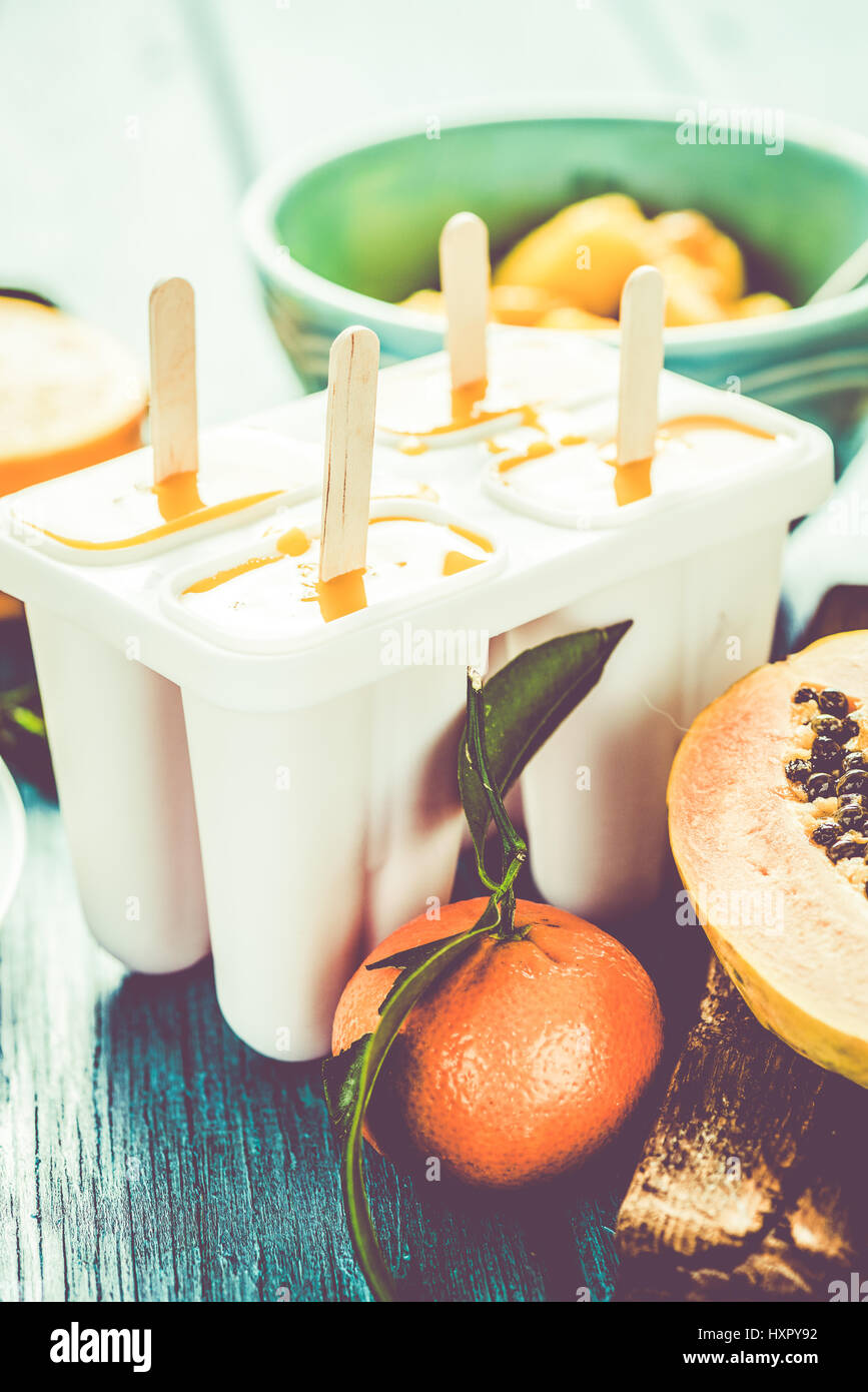 Refreshing treat, exotic fruits lolly, popsicle with ingredients Stock ...