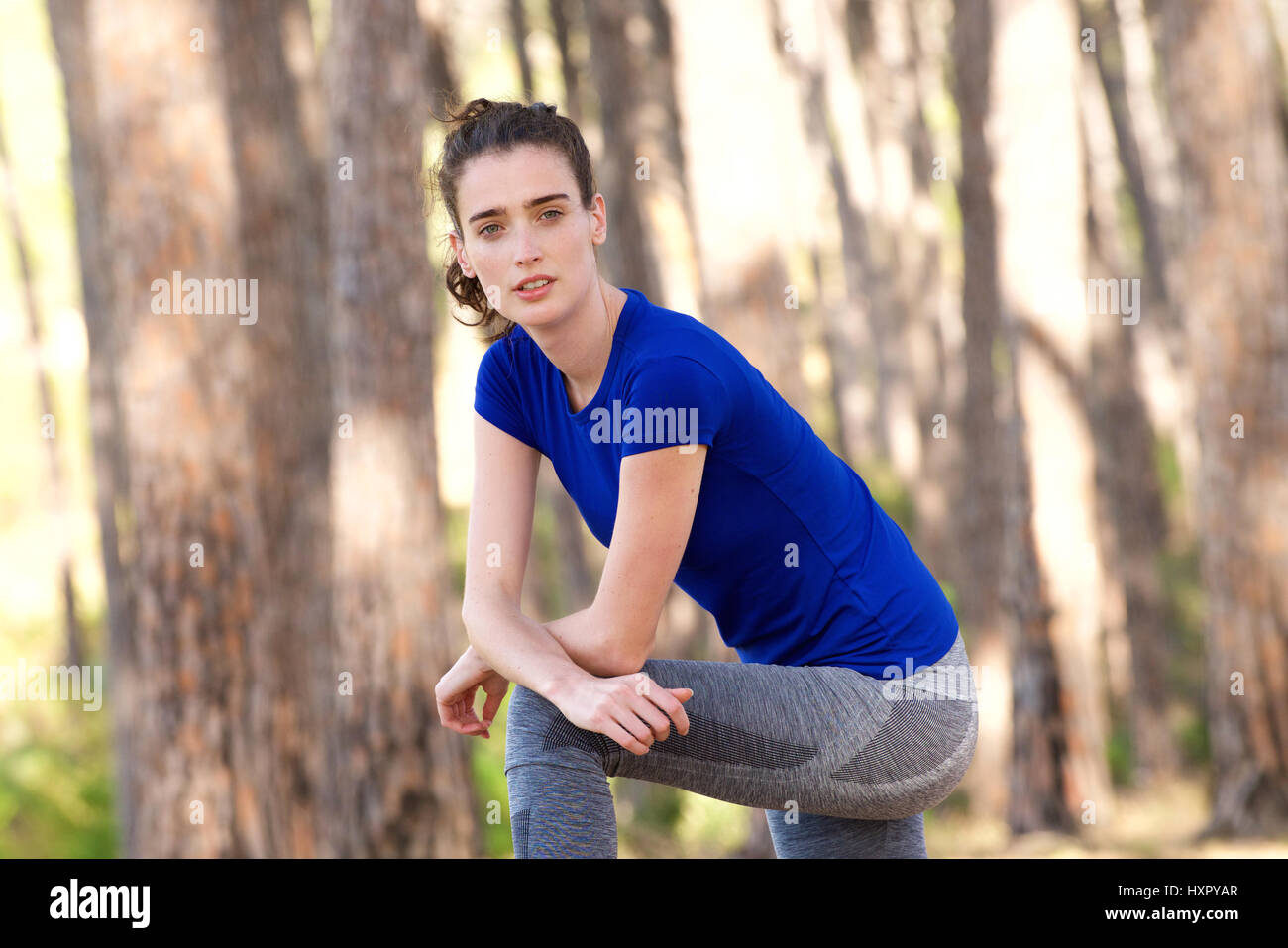 Leaning on knee hi-res stock photography and images - Alamy