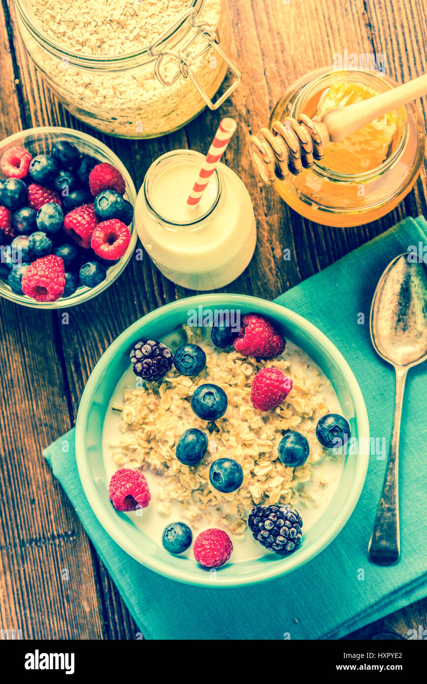 Diet concept, light breakfast with summer fruits, milk and honey Stock ...