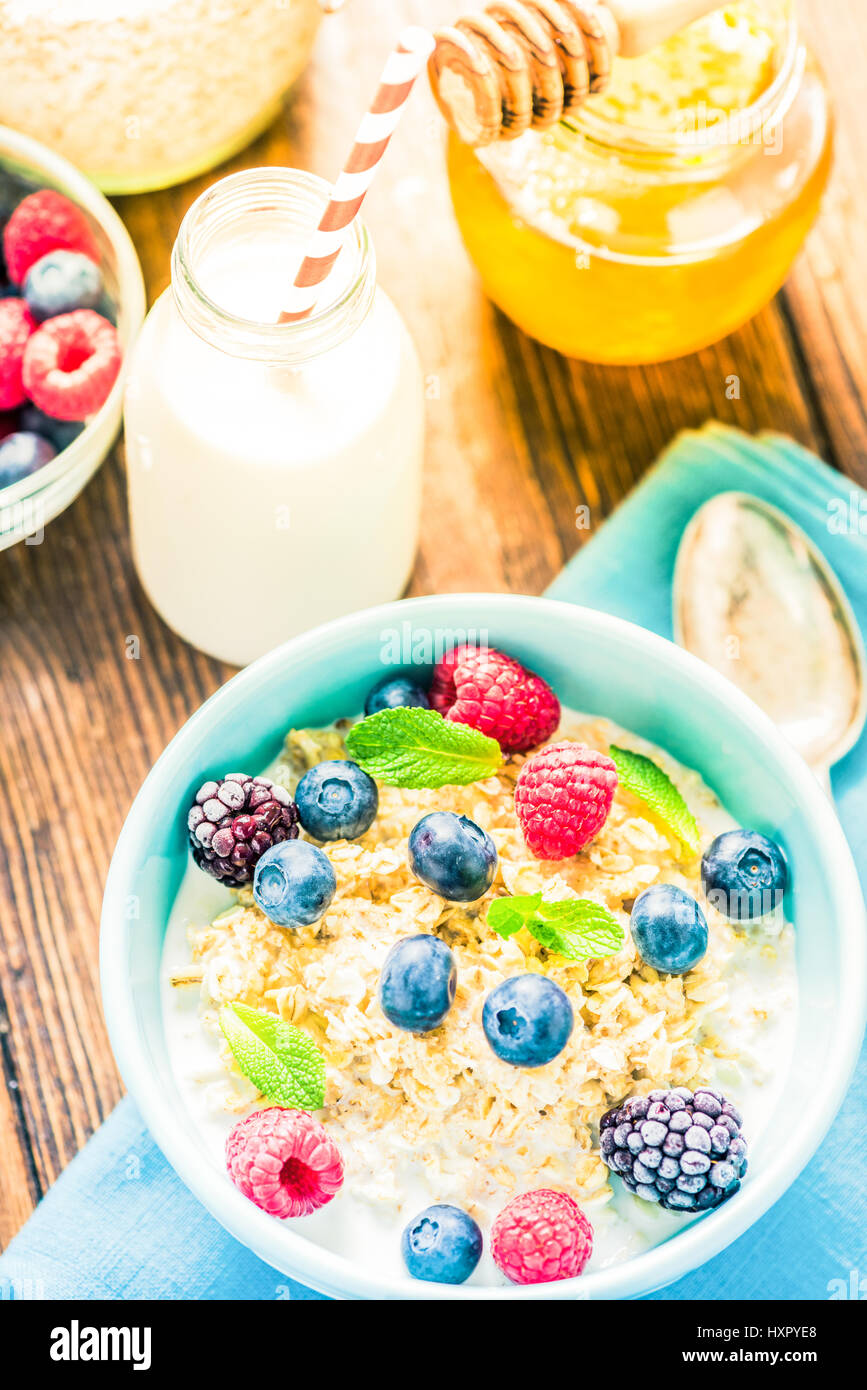 Tasty and light diet cereal breakfast with sumer fruits, fresh milk and ...