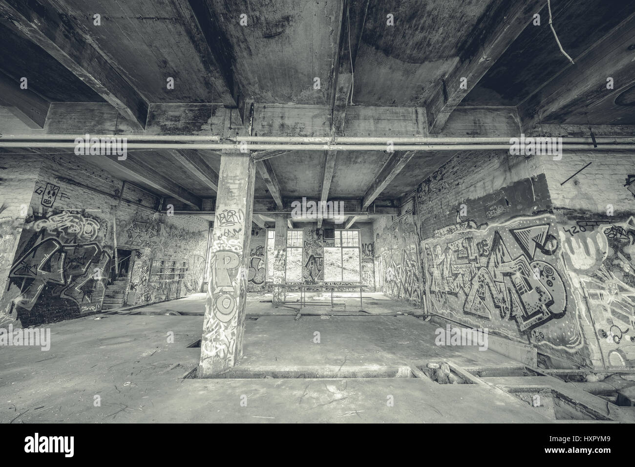 Big empty room in old abandoned factory building Stock Photo - Alamy
