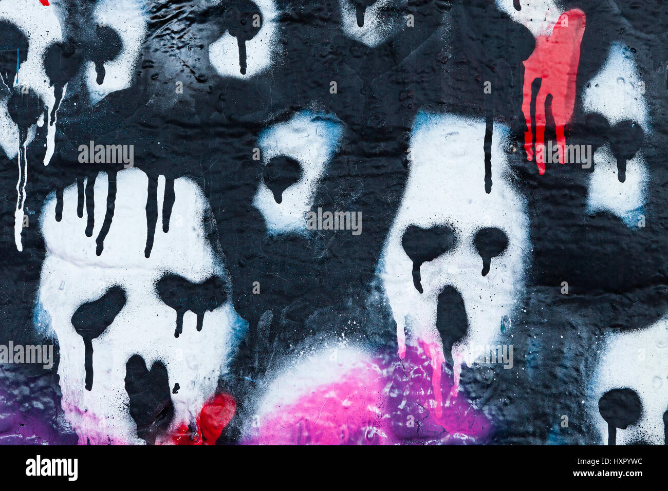 Scary faces graffiti close-up Stock Photo - Alamy