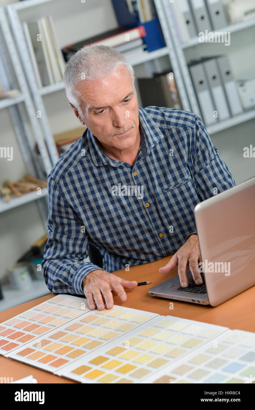 Designer selecting colour scheme Stock Photo - Alamy
