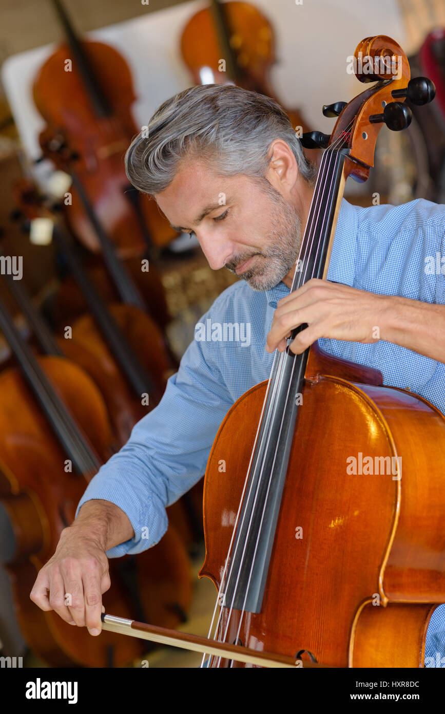 man playing the cello Stock Photo - Alamy