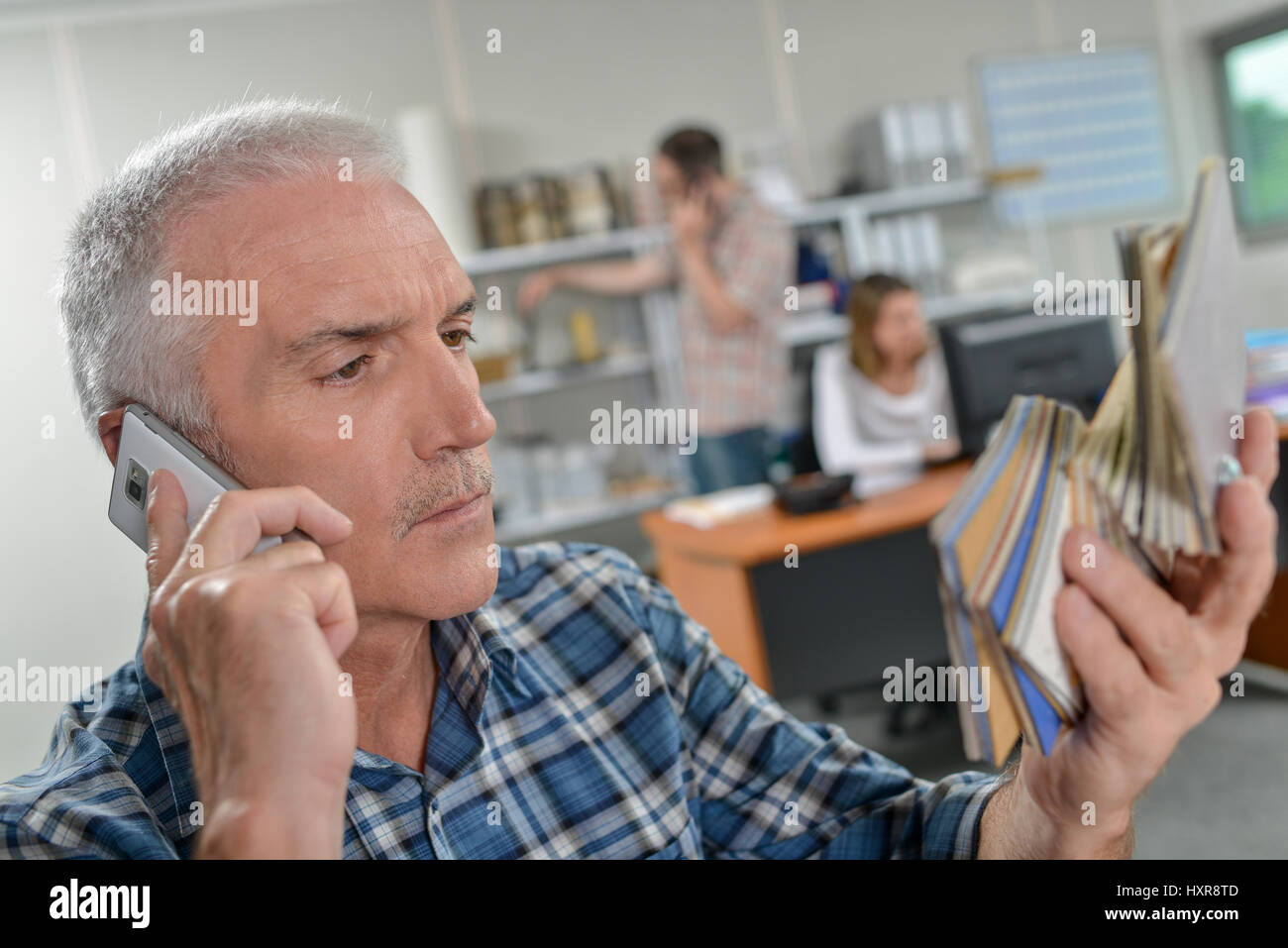 Senior boss on the phone Stock Photo - Alamy