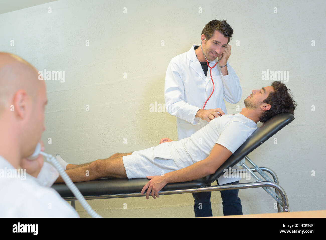 Young man having medical Stock Photo - Alamy