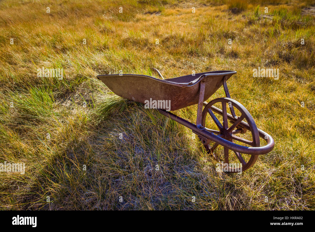 Broken wheelbarrow hi-res stock photography and images - Alamy