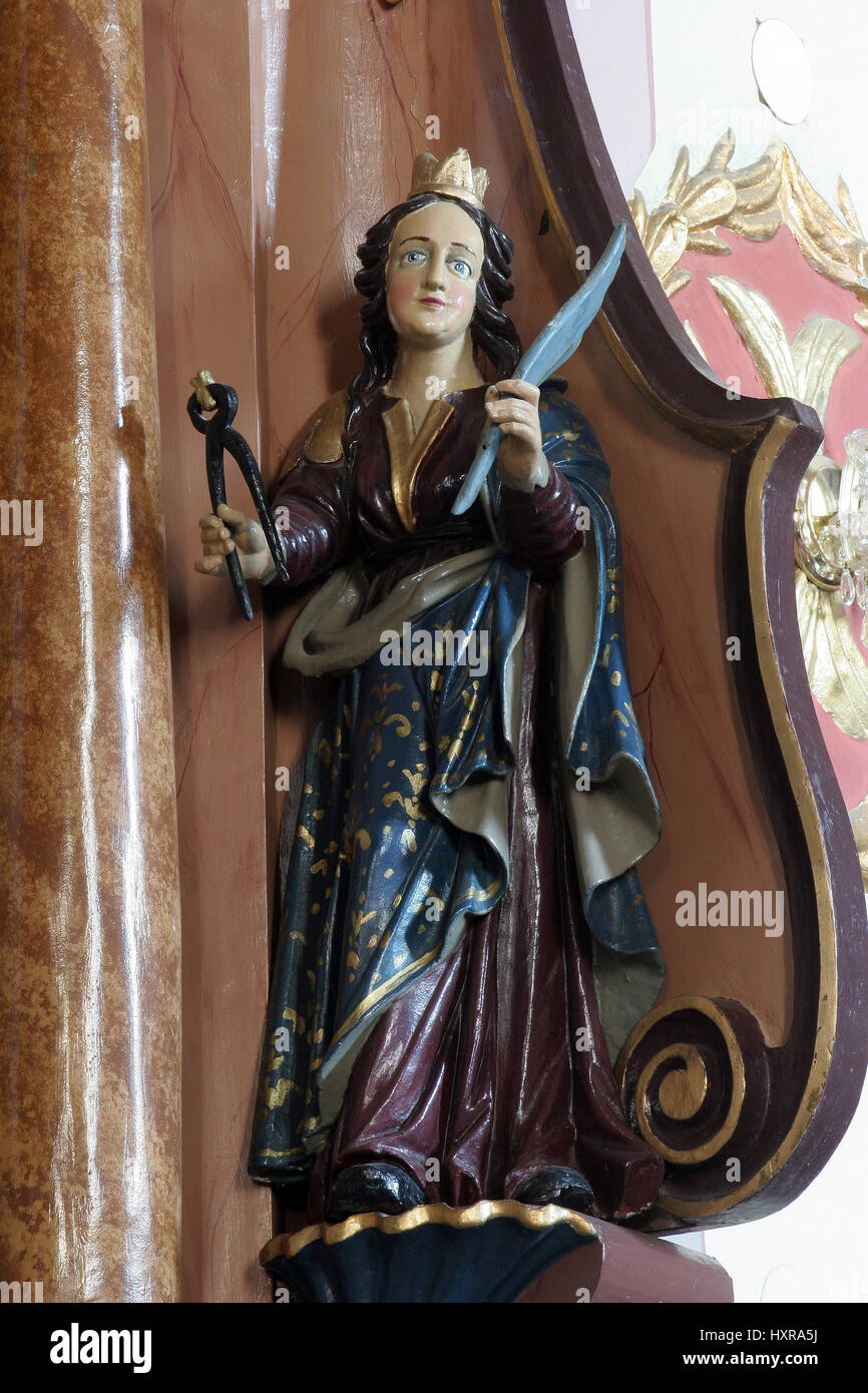 Saint Apollonia statue on the altar in Parish Church of Saint Martin in ...