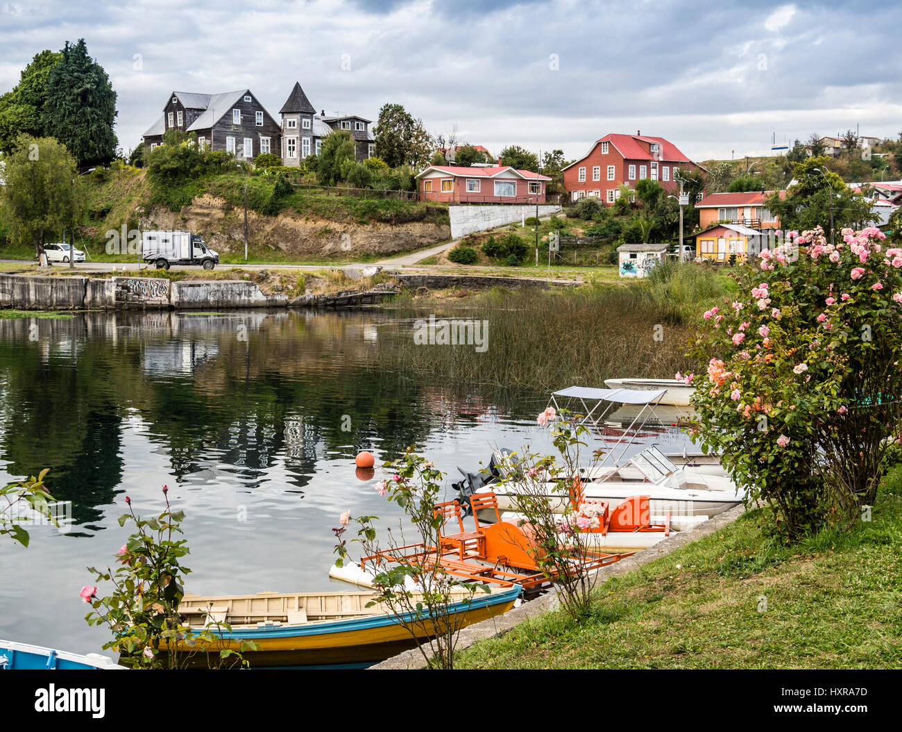 Boats anchor at the campsite of Puerto Octay, at lake lago llanquihue ...