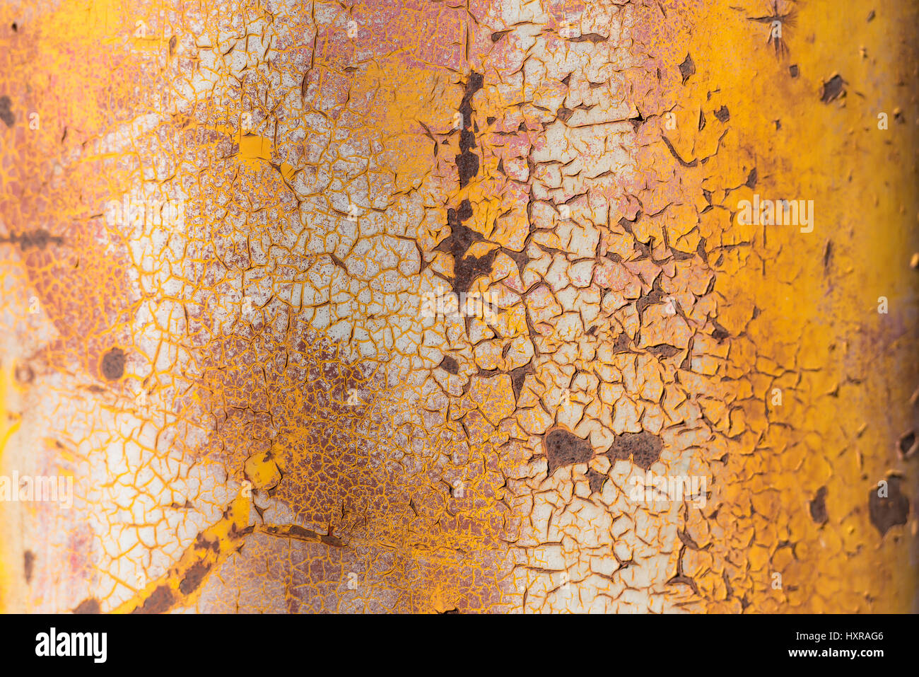 Texture of cracked and rusty yellow metal surface Stock Photo - Alamy