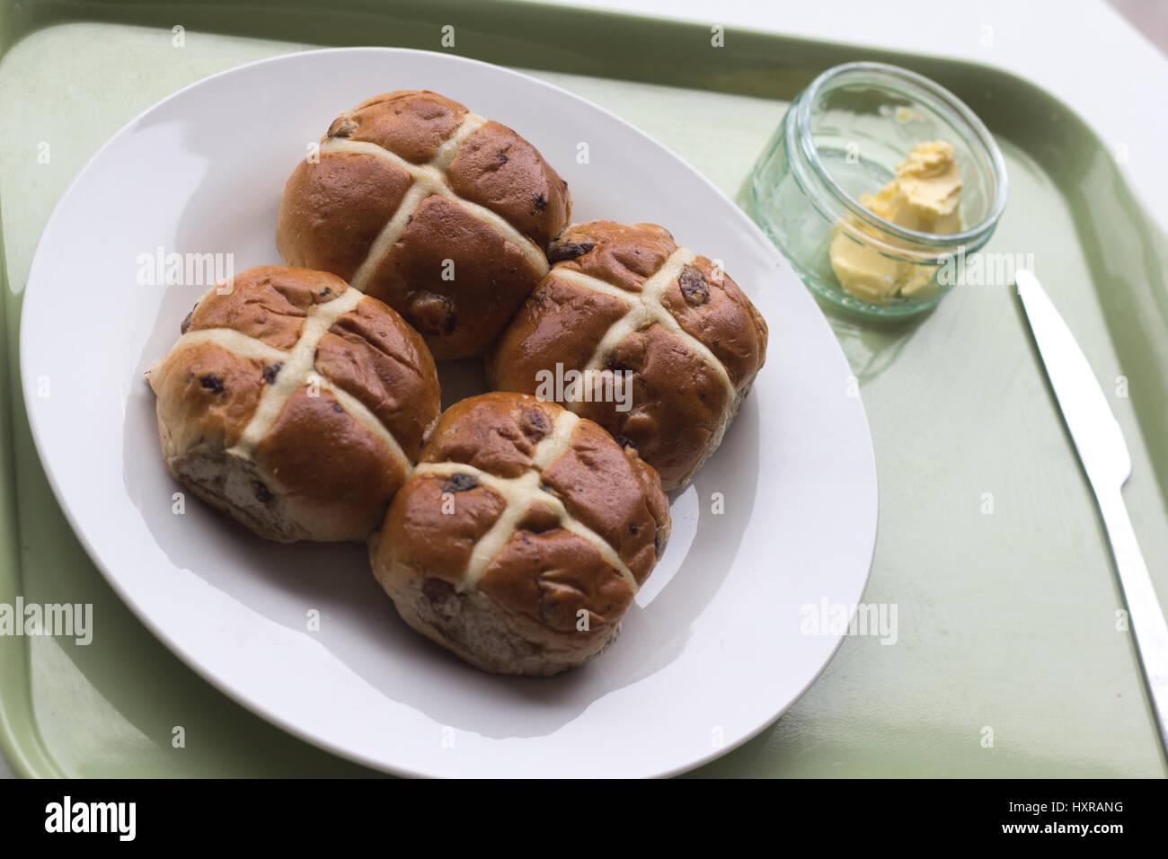 In 12th century an Anglican monk baked the buns and marked them with a ...