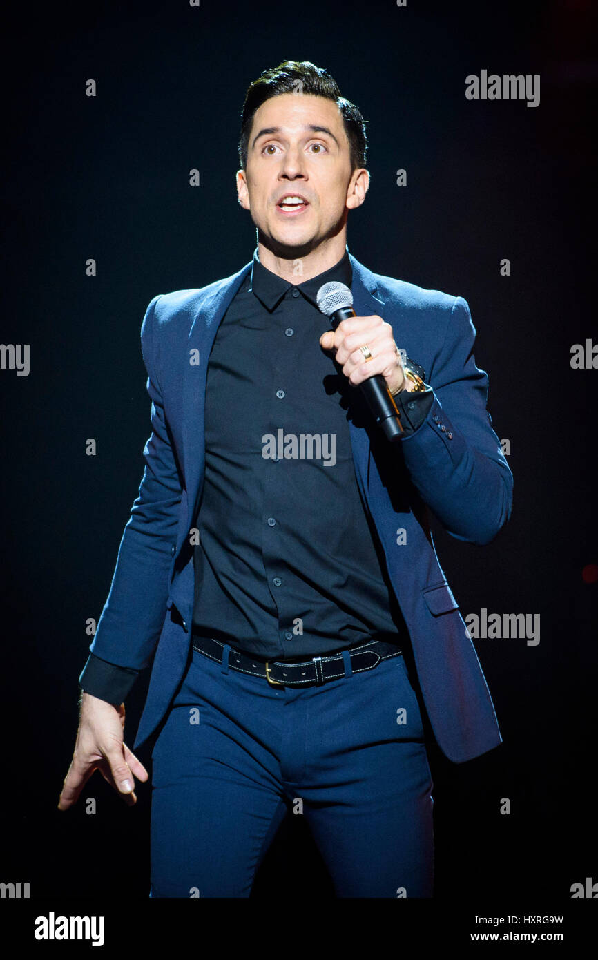 Russell Kane performing on stage at the Royal Albert Hall in London ...