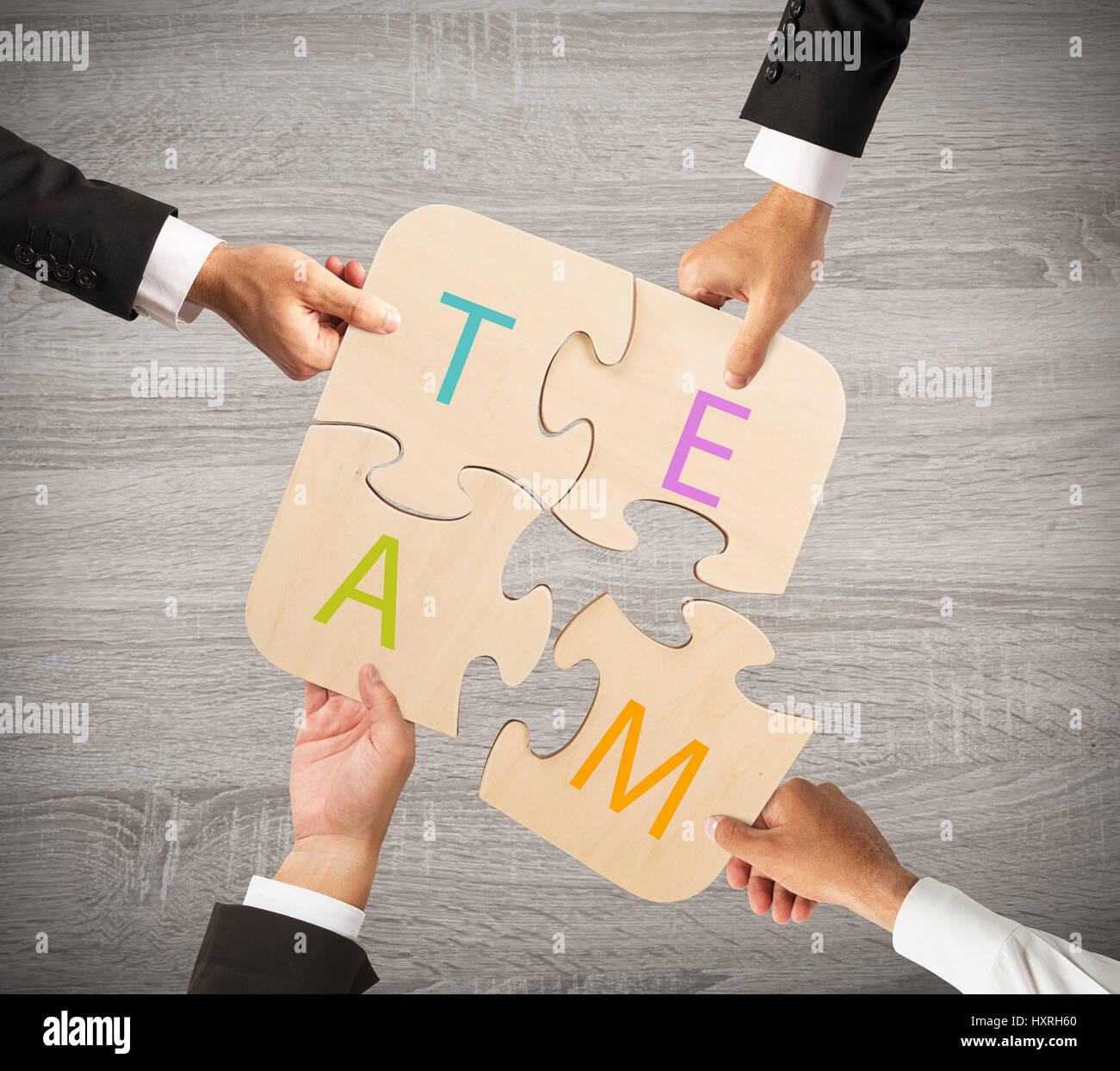 Team work for one goal Stock Photo - Alamy