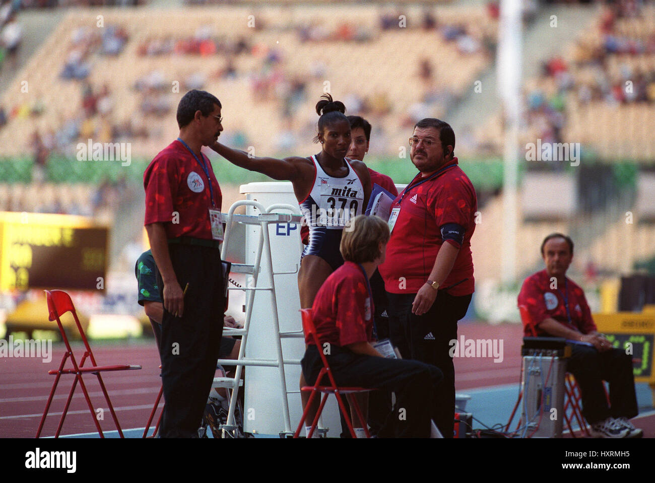 DENISE LEWIS & JUDGES LONG JUMP 26 August 1999 Stock Photo - Alamy