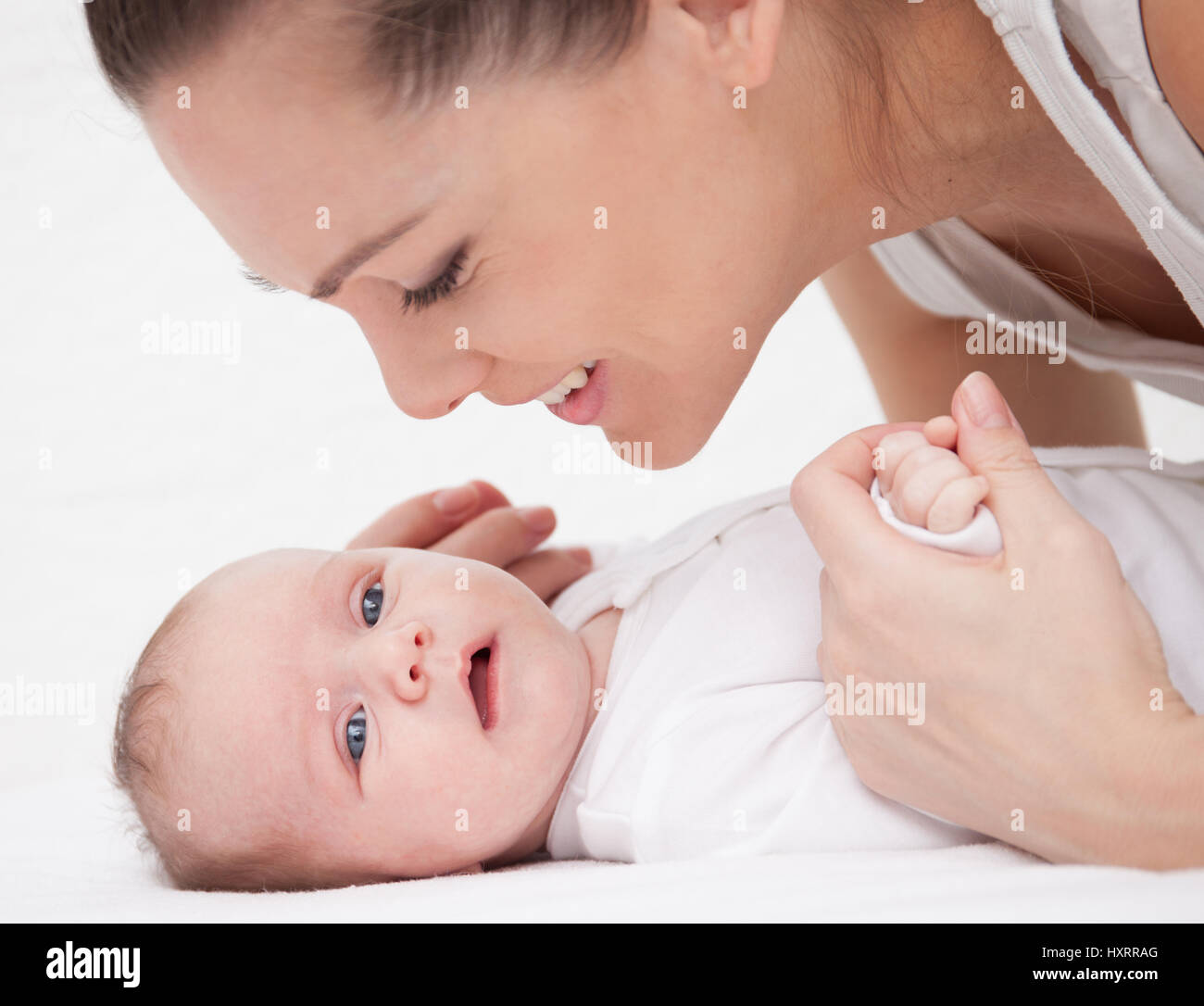 Child kissing mother hand hi-res stock photography and images - Alamy