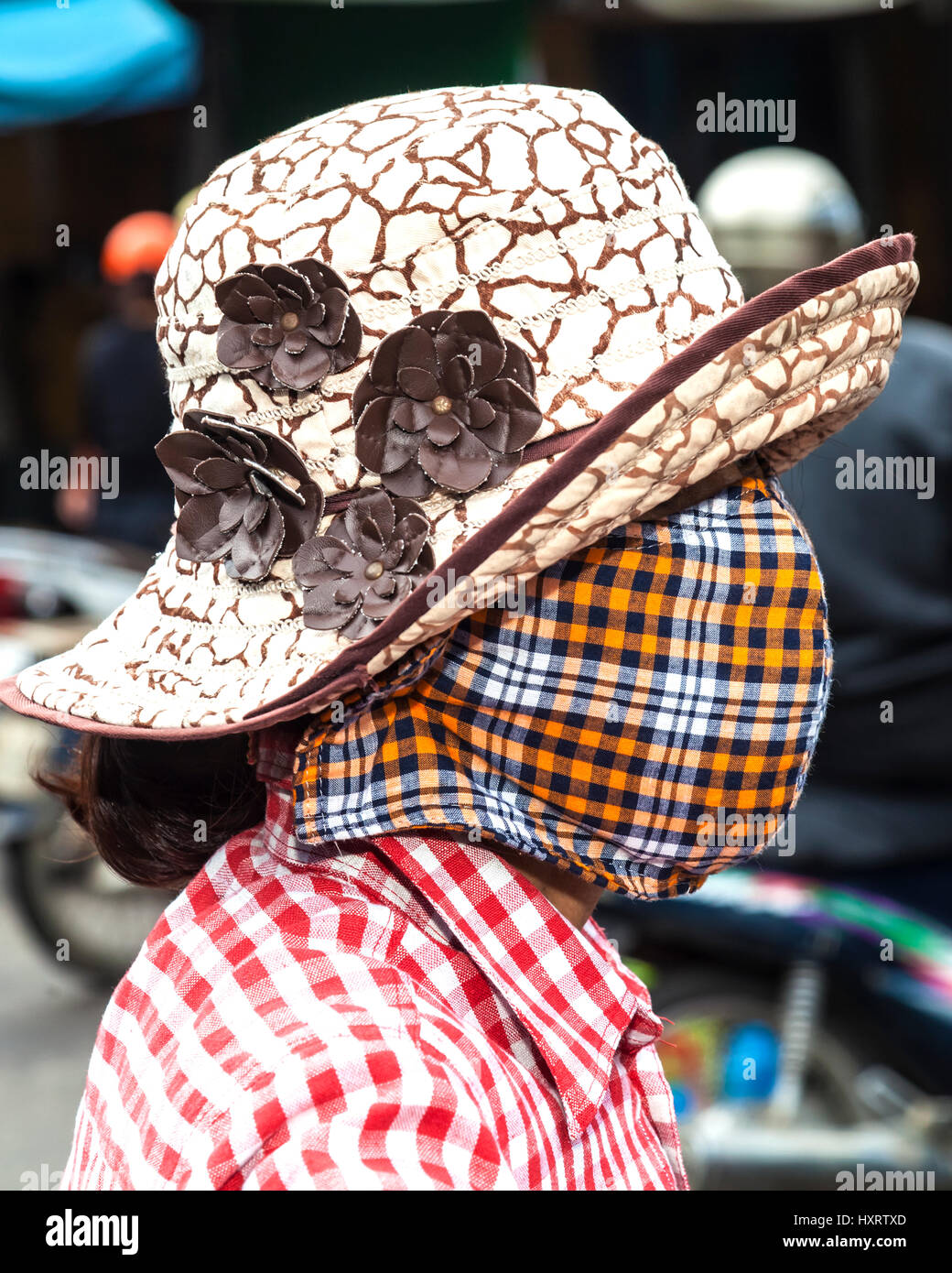 Face mask helps Vietnamese woman keep the fumes at bay Stock Photo - Alamy