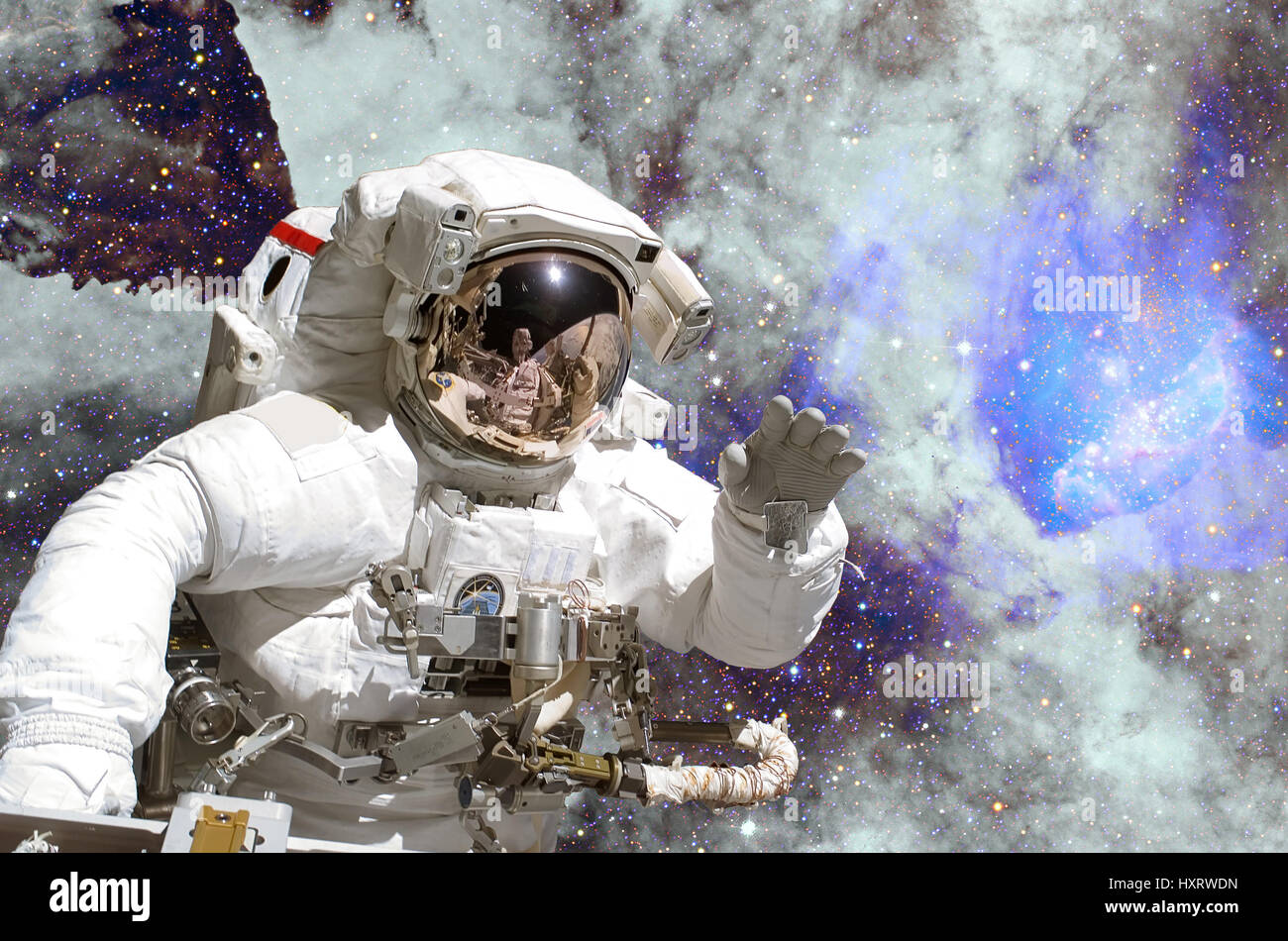 Astronaut in outer space. Galaxy and stars on the background. Elements ...