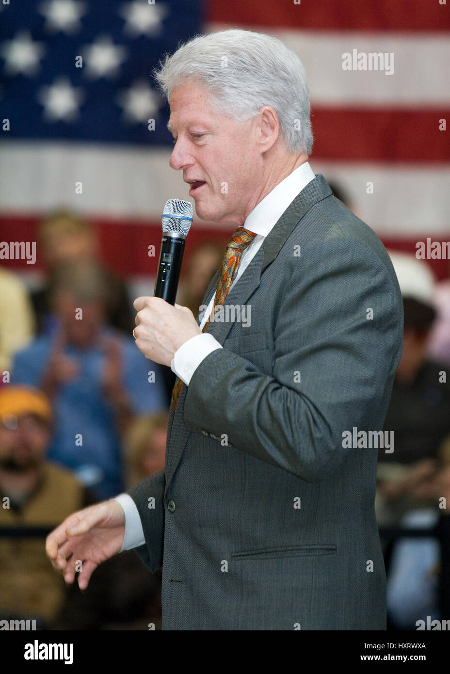 Former President Bill Clinton at a campaign rally with his wife Hillary ...