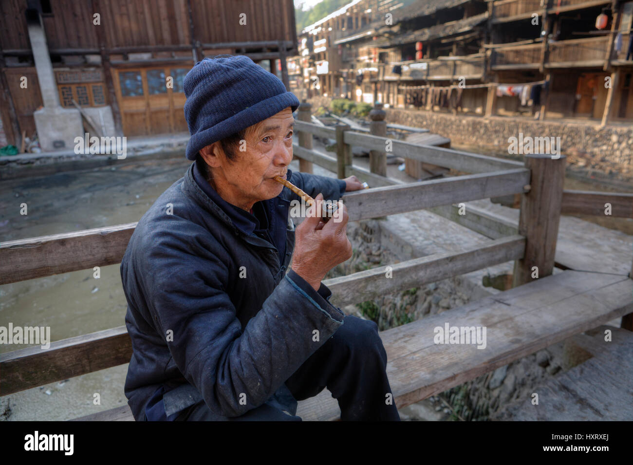 Farmer sitting china hi-res stock photography and images - Alamy
