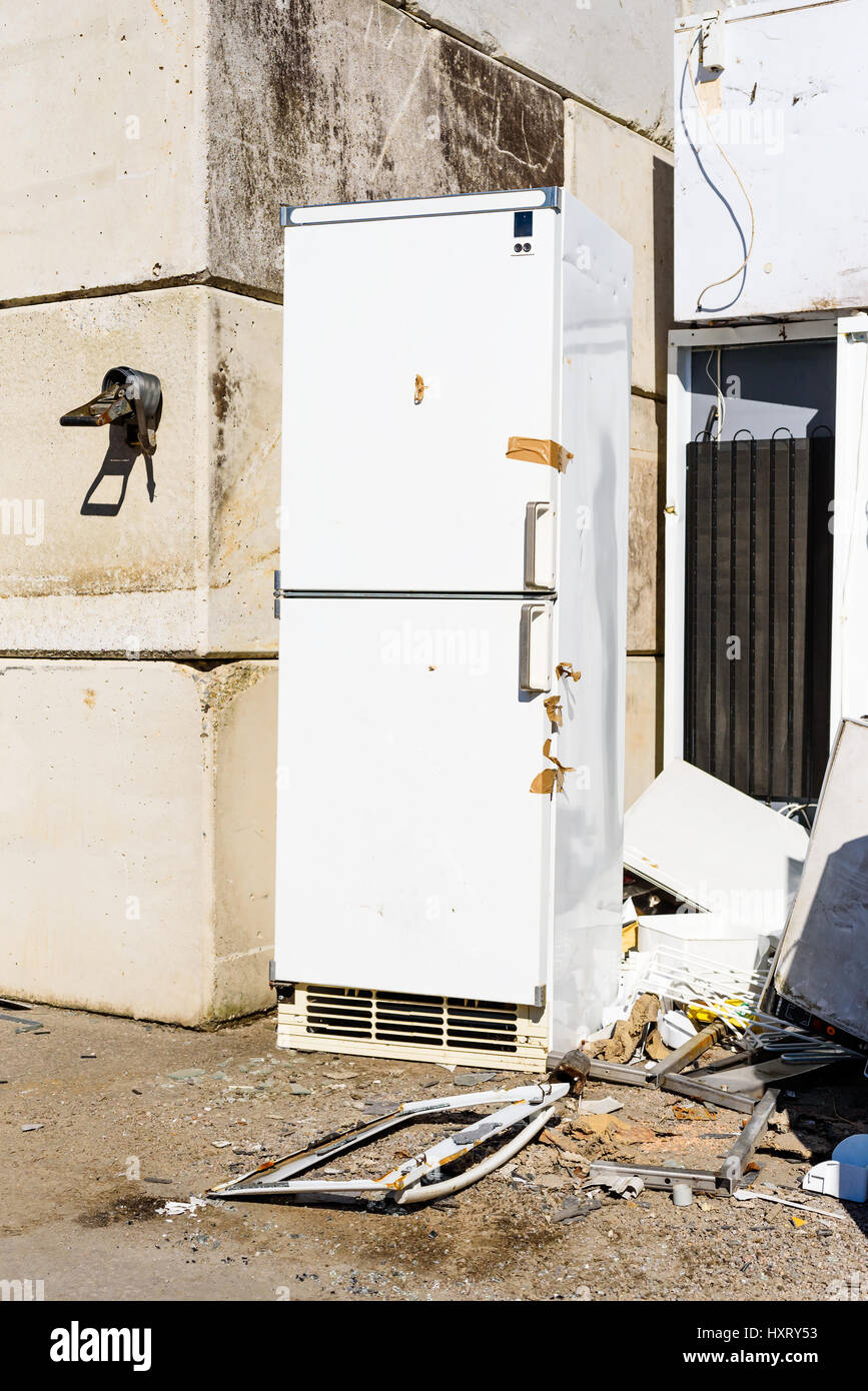 Discarded fridges and freezers at a local waste station. Here they ...