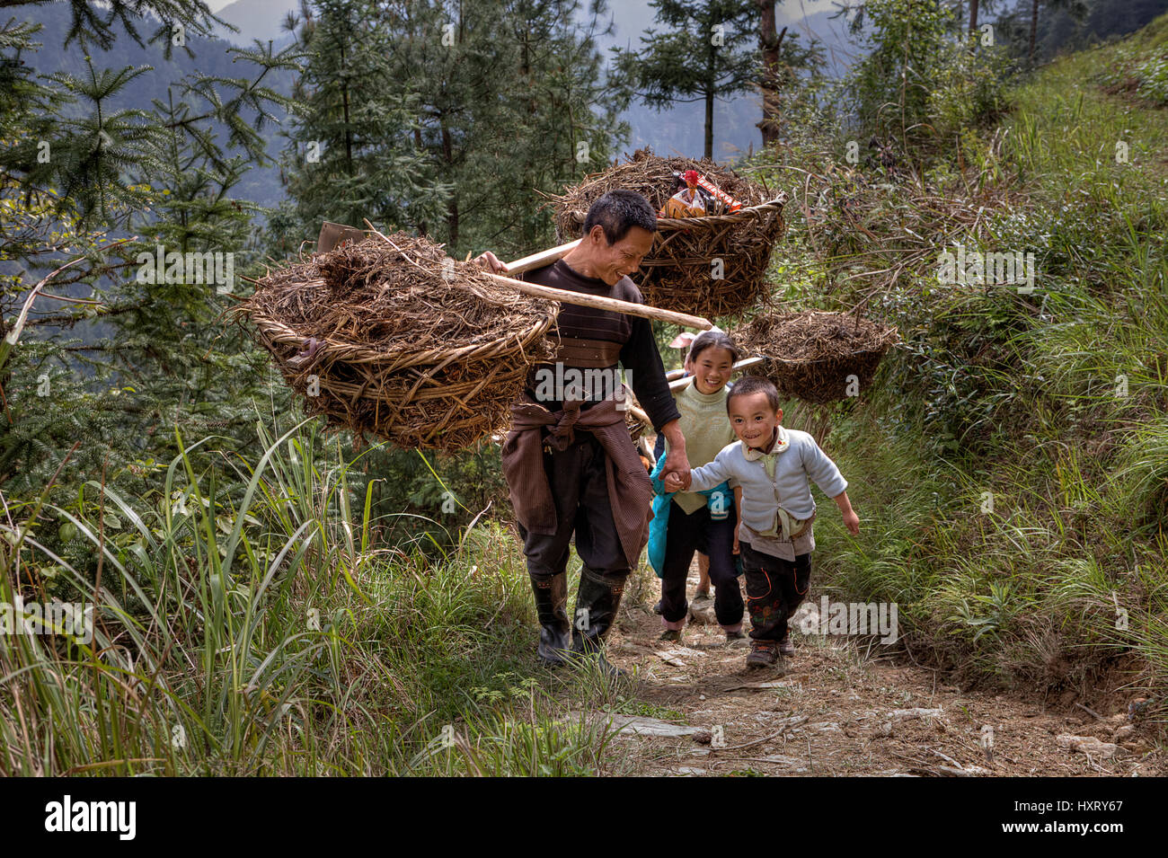 Old man carrying heavy load hi-res stock photography and images - Alamy