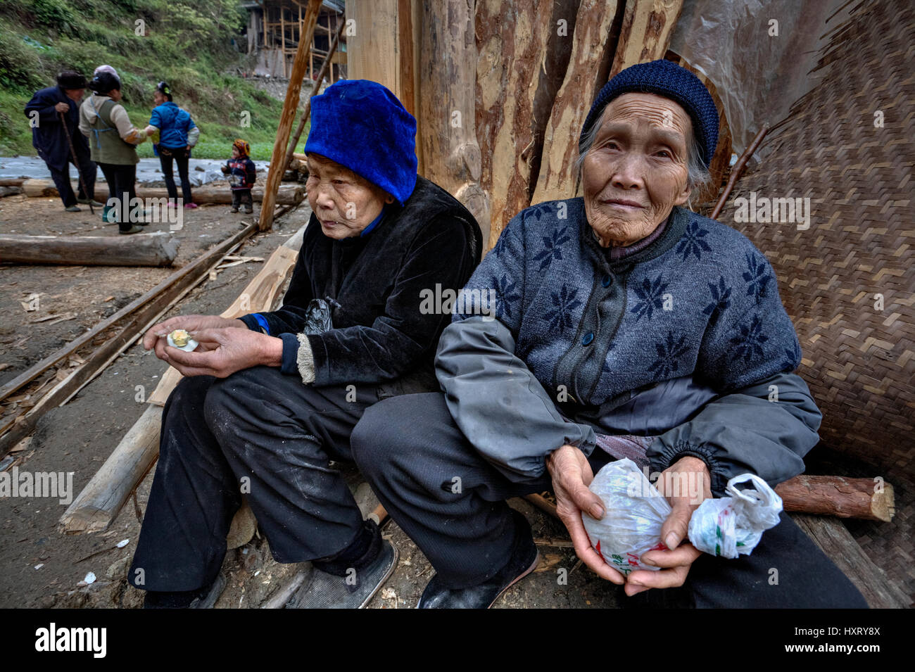 Langde Village, Guizhou, China - April 16, 2010: Two elderly Chinese ...