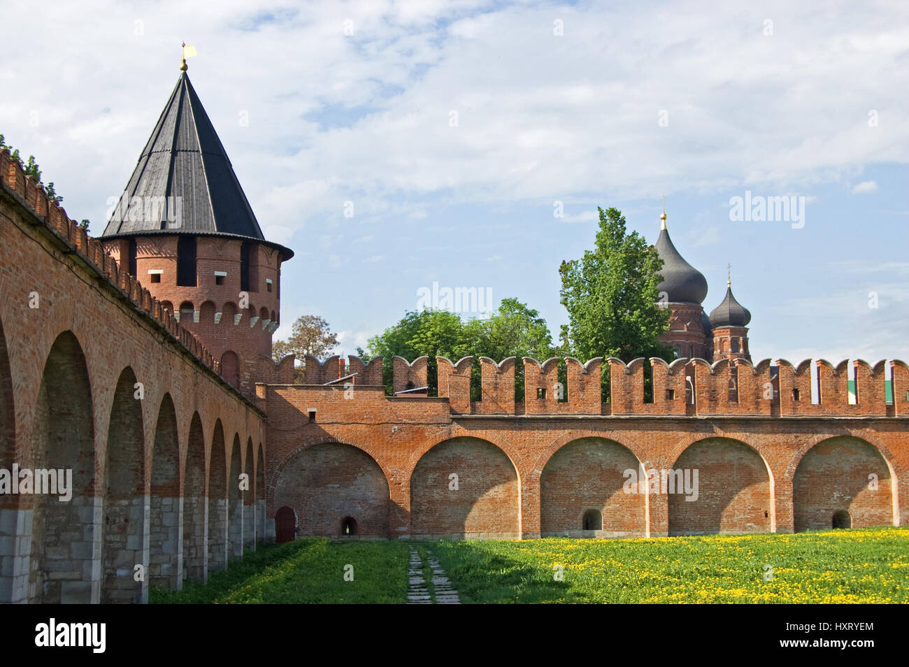 Brick walls of the fortress, green grass Stock Photo - Alamy